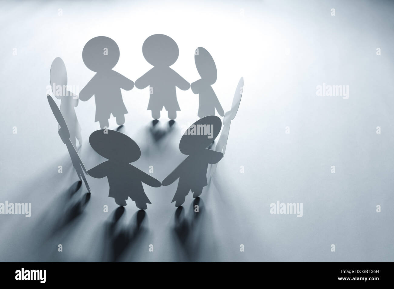 Paper chain friends, family or community Stock Photo - Alamy