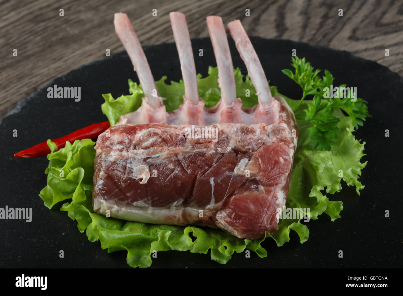 Lamb Frenched Rack 4 rib bone Stock Photo - Alamy
