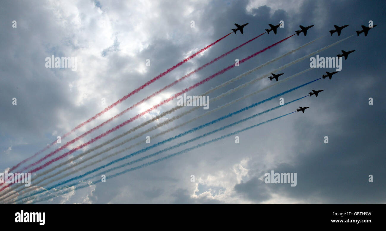 The RAF Red Arrows perform a flypast during the Armed Forces Day at the ...