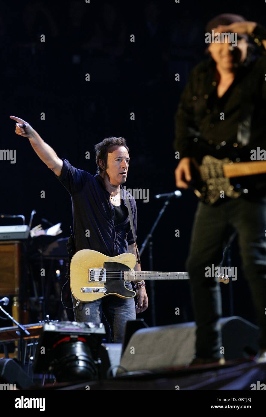 Bruce Springsteen (left) performs with the E Street band during the ...