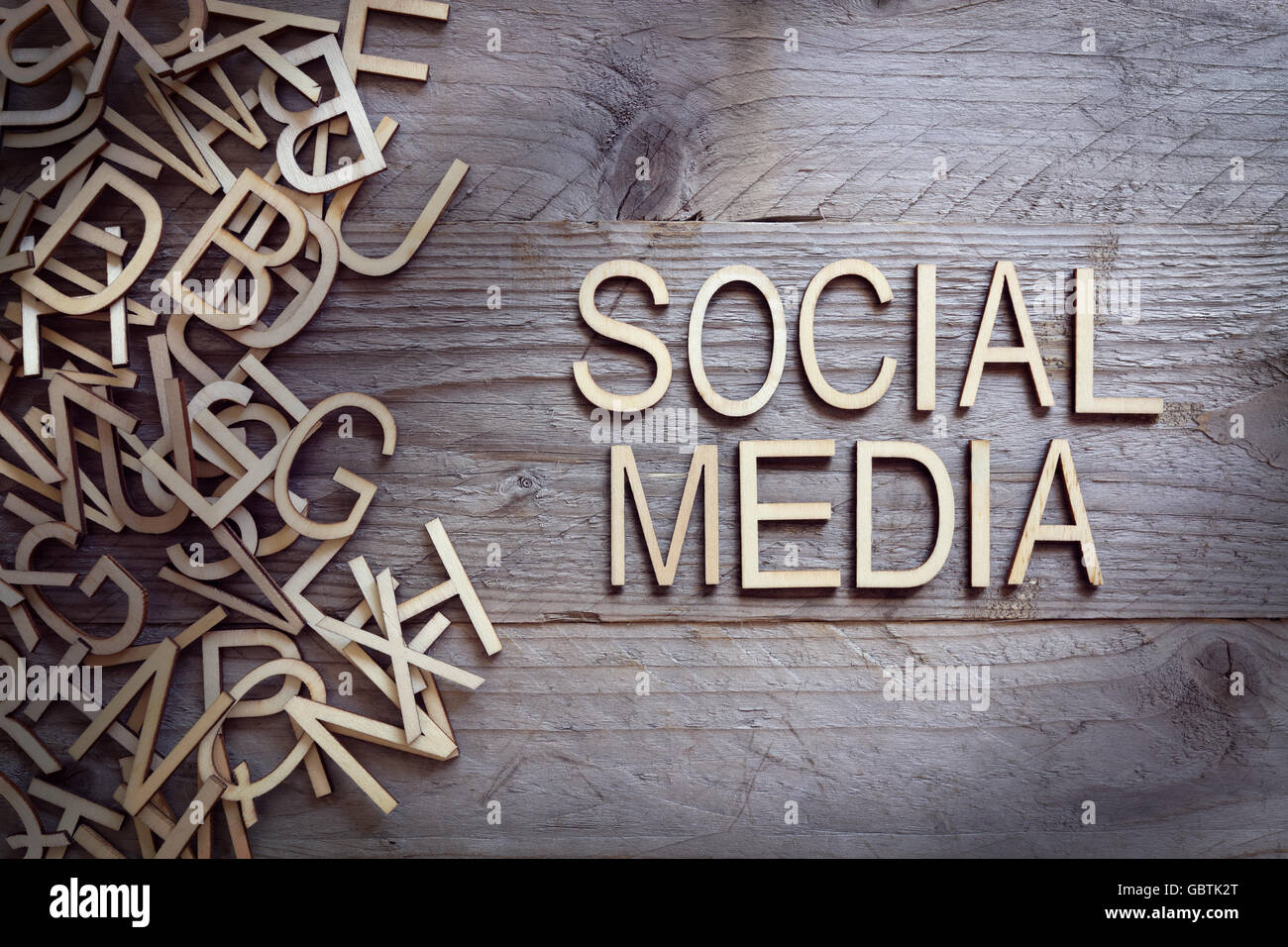 Social media and network concept wood letters on wooden background ...