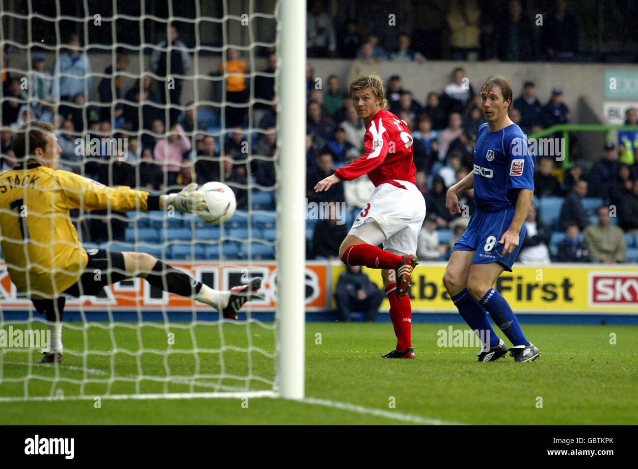 Millwall's goalkeeper Graham Stack makes a finger tip save from ...