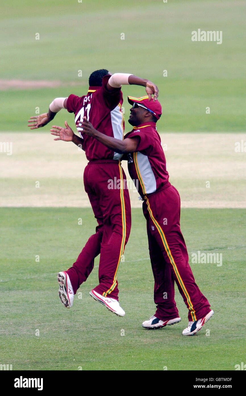 West Indies' Dwayne Bravo (l) celebrates with captain Brian Lara after ...