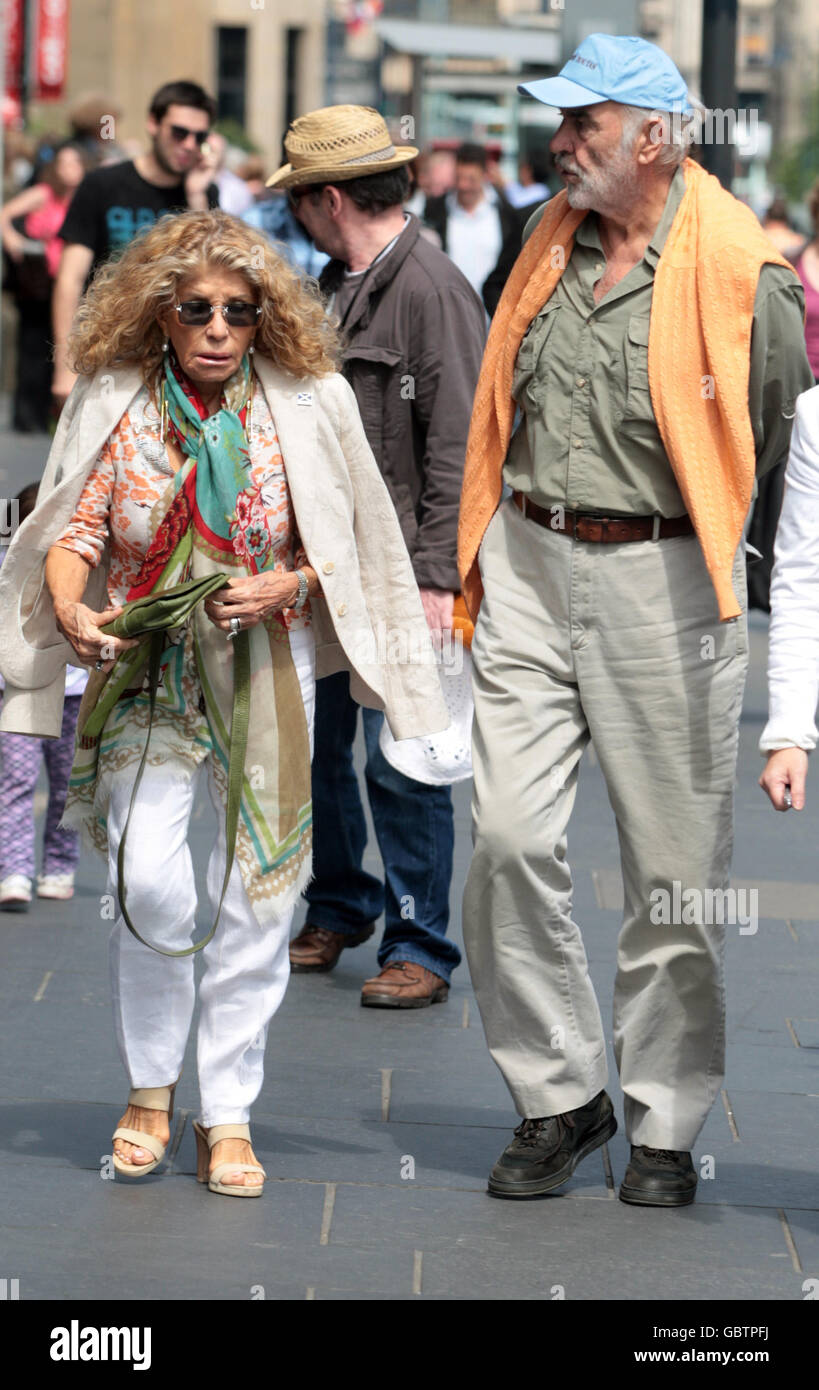 Sir Sean Connery and his wife Micheline Roquebrune (left) walk along ...