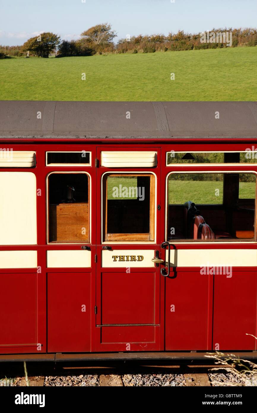 A red third class vintage railway carriage Stock Photo - Alamy