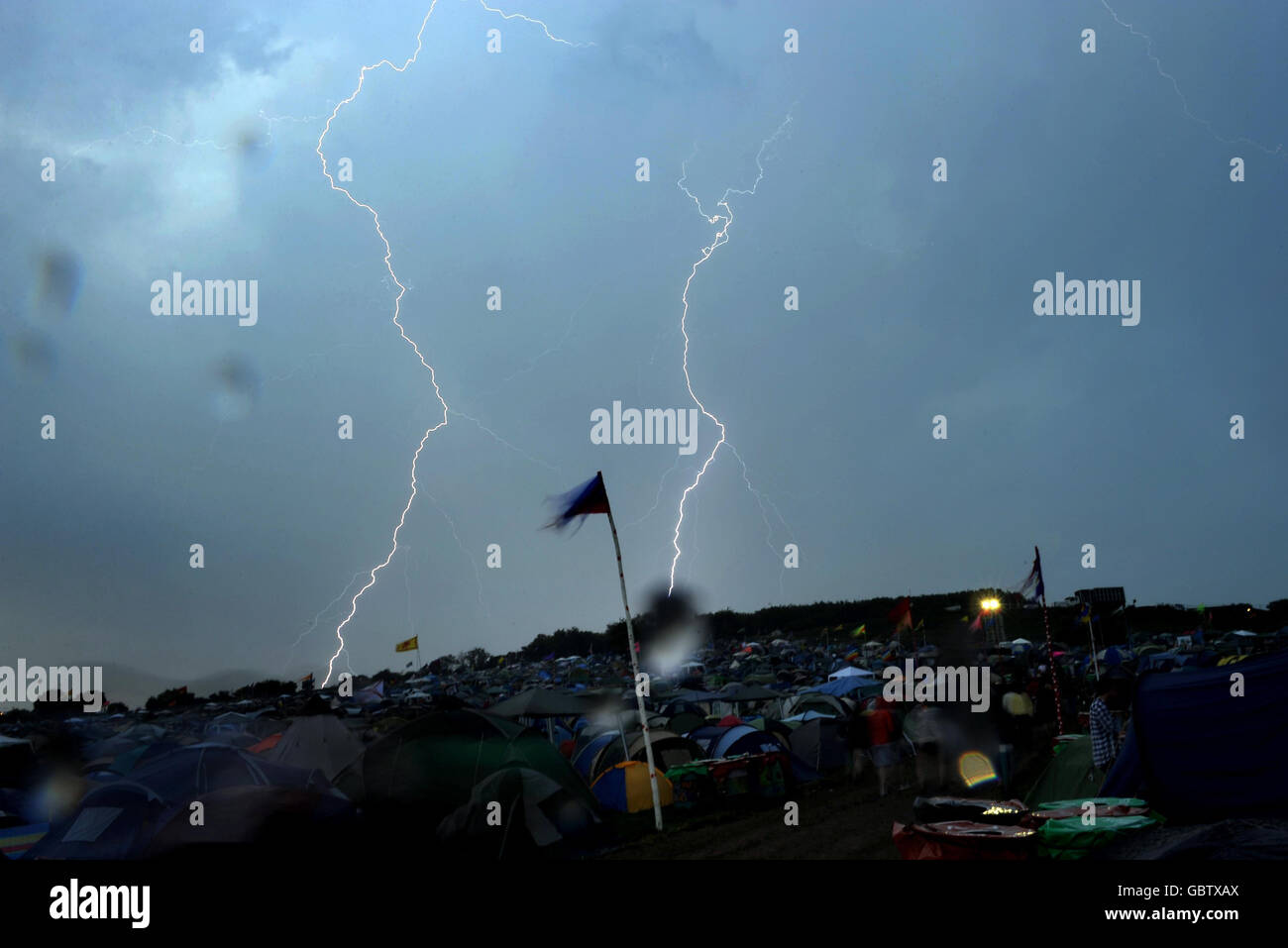 Lightning flashes at the 2009 Glastonbury Festival taking place at ...