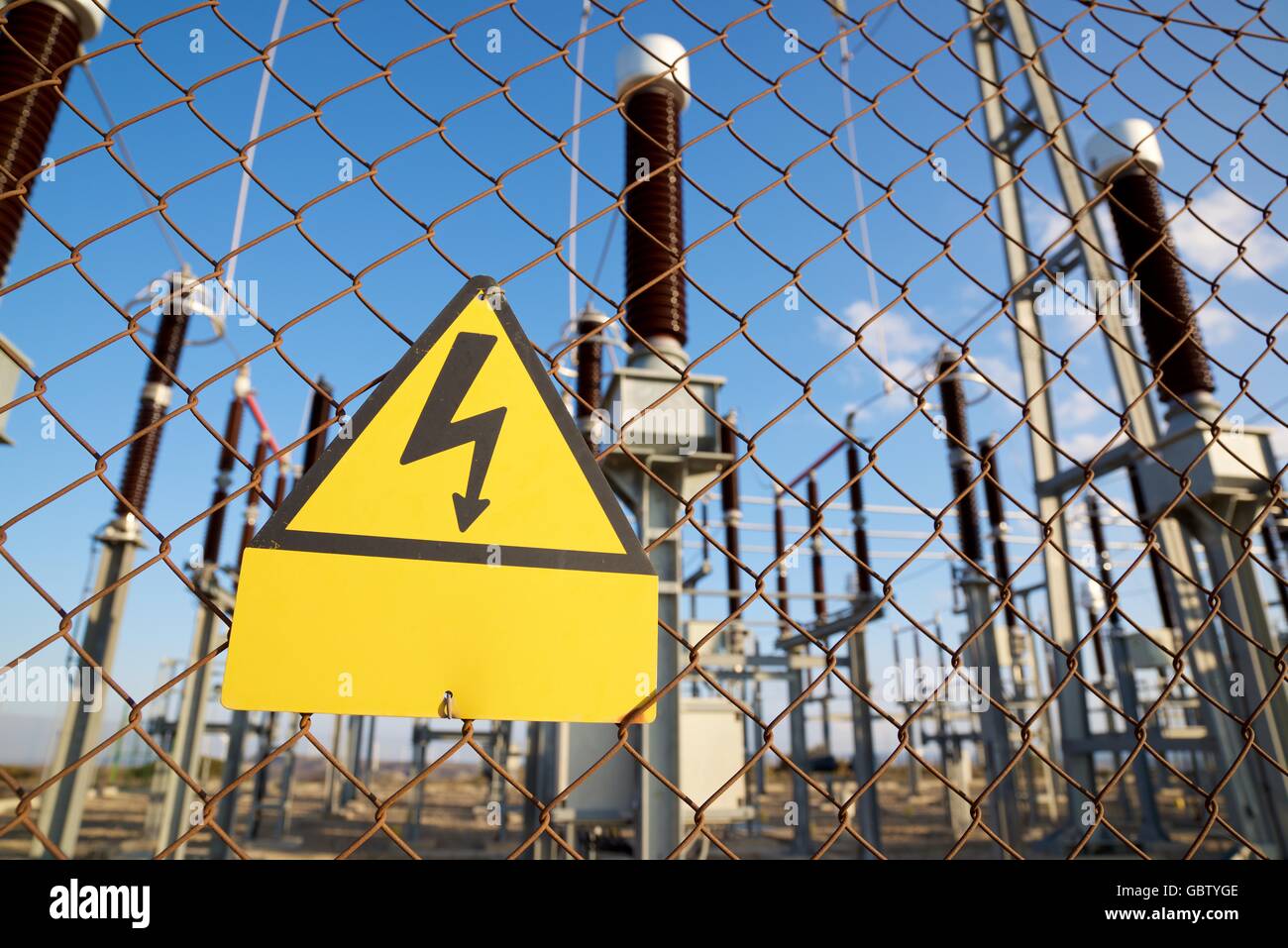 electrical hazard sign placed on a metal fence Stock Photo - Alamy