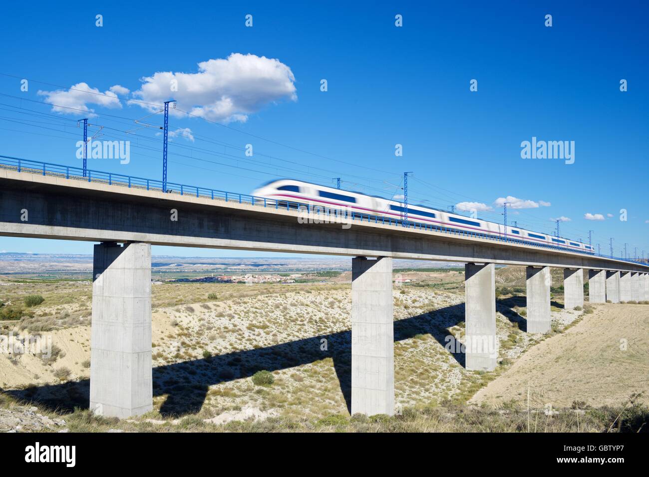 view of a high-speed train crossing a viaduct in Roden, Zaragoza, Aragon, Spain. AVE Madrid ...