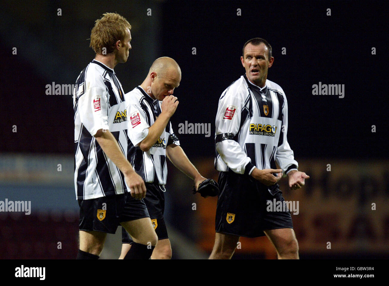 (l-r) Notts County's Paul Bolland, Tony Scully and Mike Whitlow walk ...