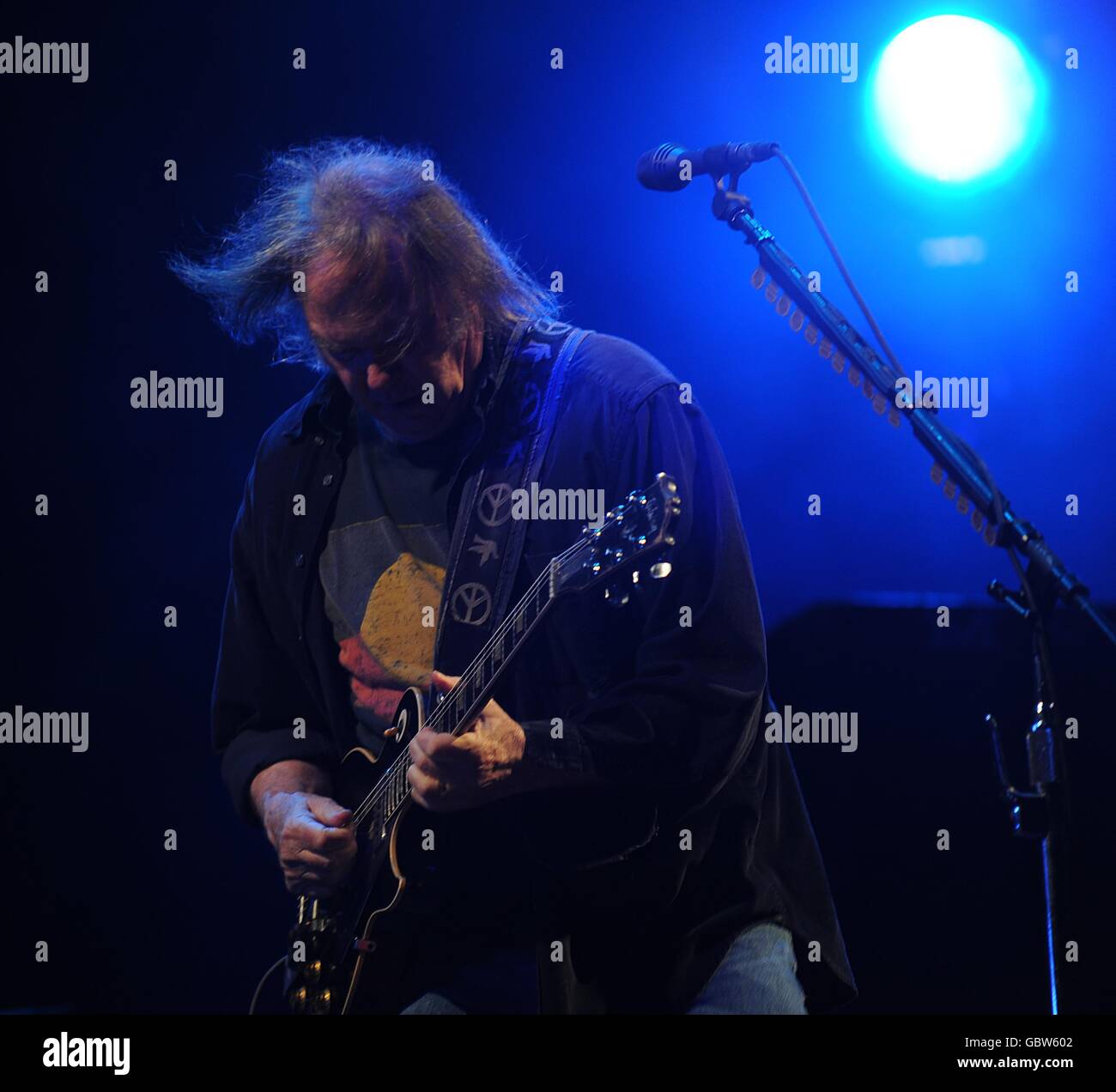 Neil Young performing on the Pyramid Stage during the 2009 Glastonbury ...