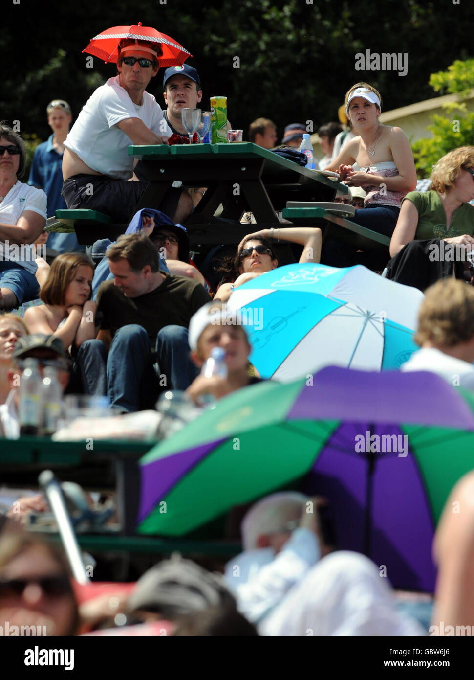 Tennis fans enjoy the warm weather on Murray Mount during the 2009 ...