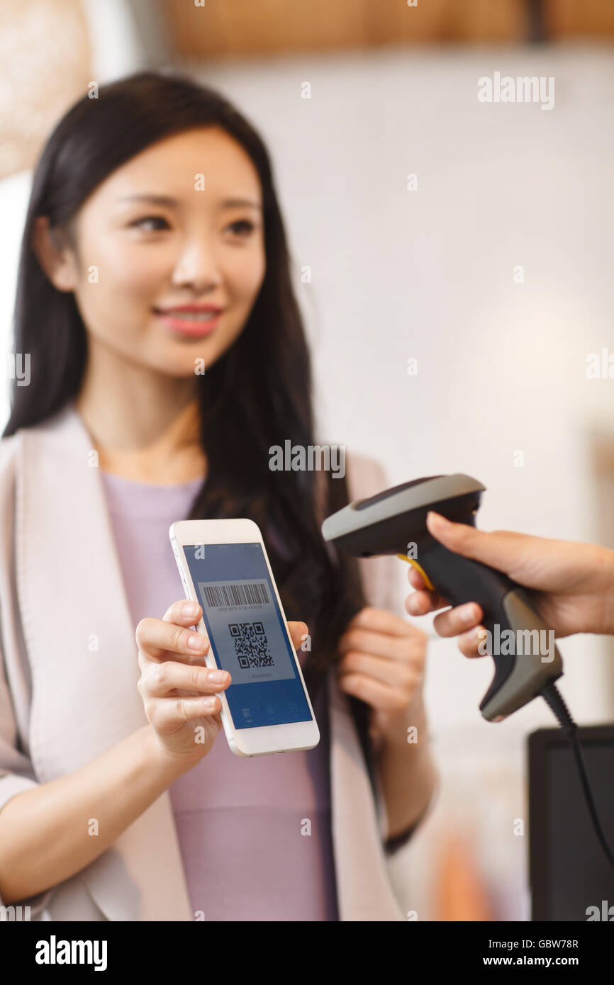 Paying mobile china hi-res stock photography and images - Alamy