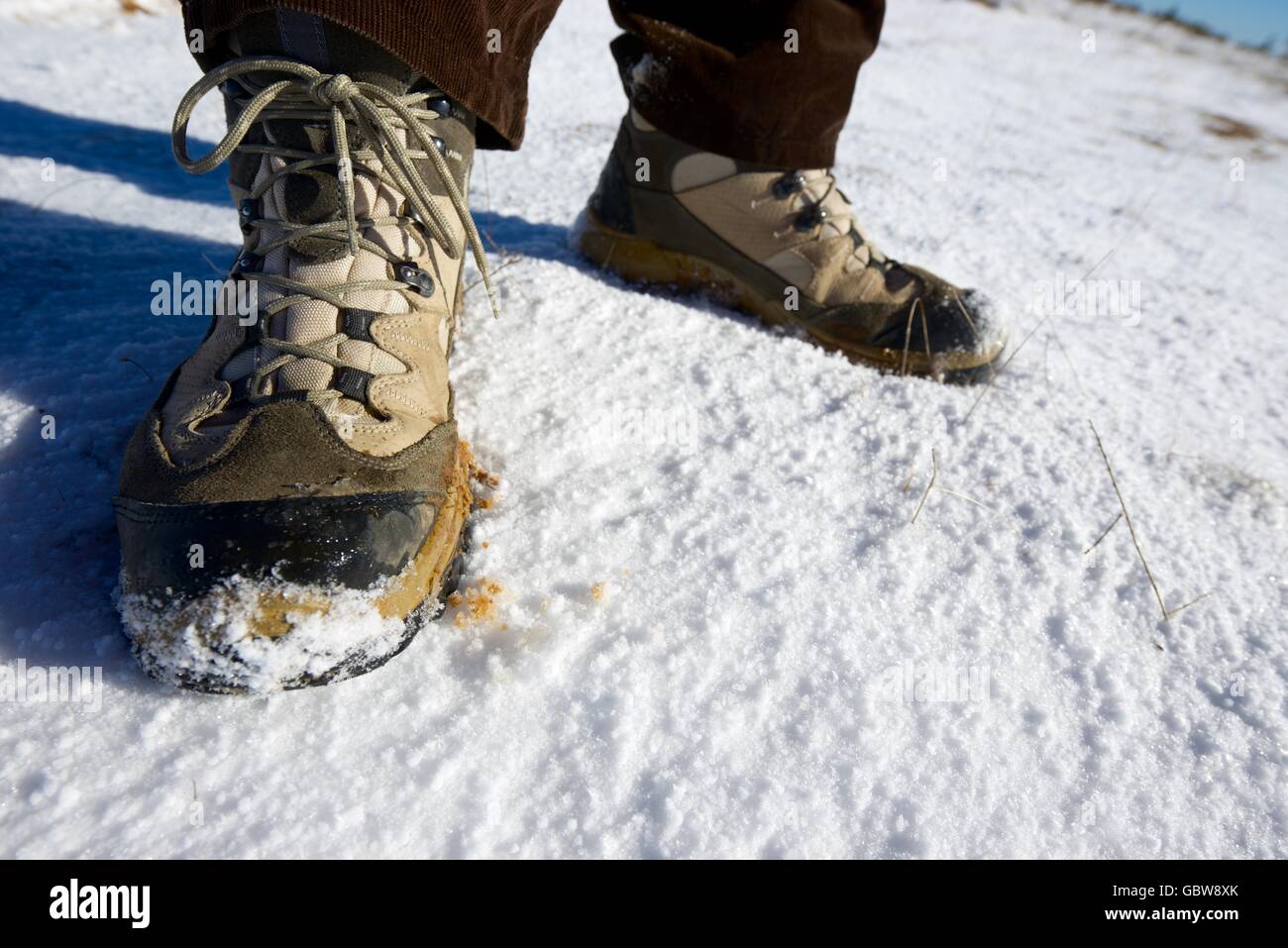 Closeup of hiking boots in the snow Stock Photo - Alamy