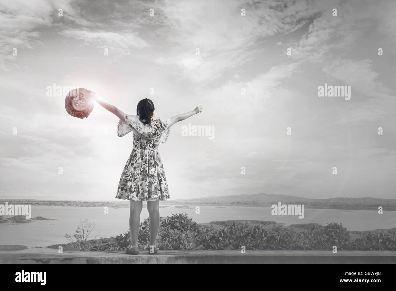 Black and white picture of back or rare view girl or women standing and ...