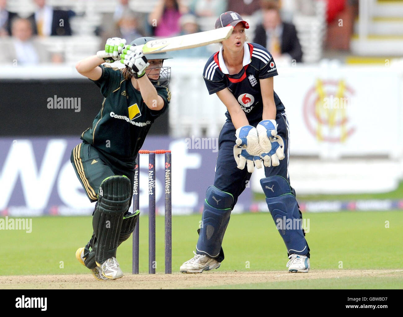 Full length batting cricket women hi-res stock photography and images ...