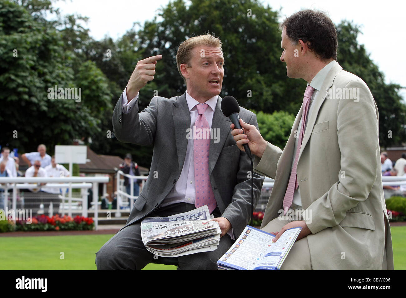 Sandown Park's Anthony Kemp (right) interviews racing experts during ...