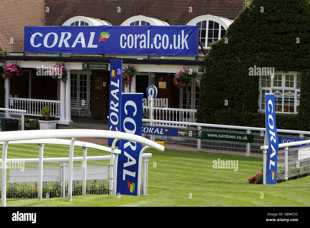 Horse Racing - Coral-Eclipse Day - Sandown Park. Coral signage by the ...