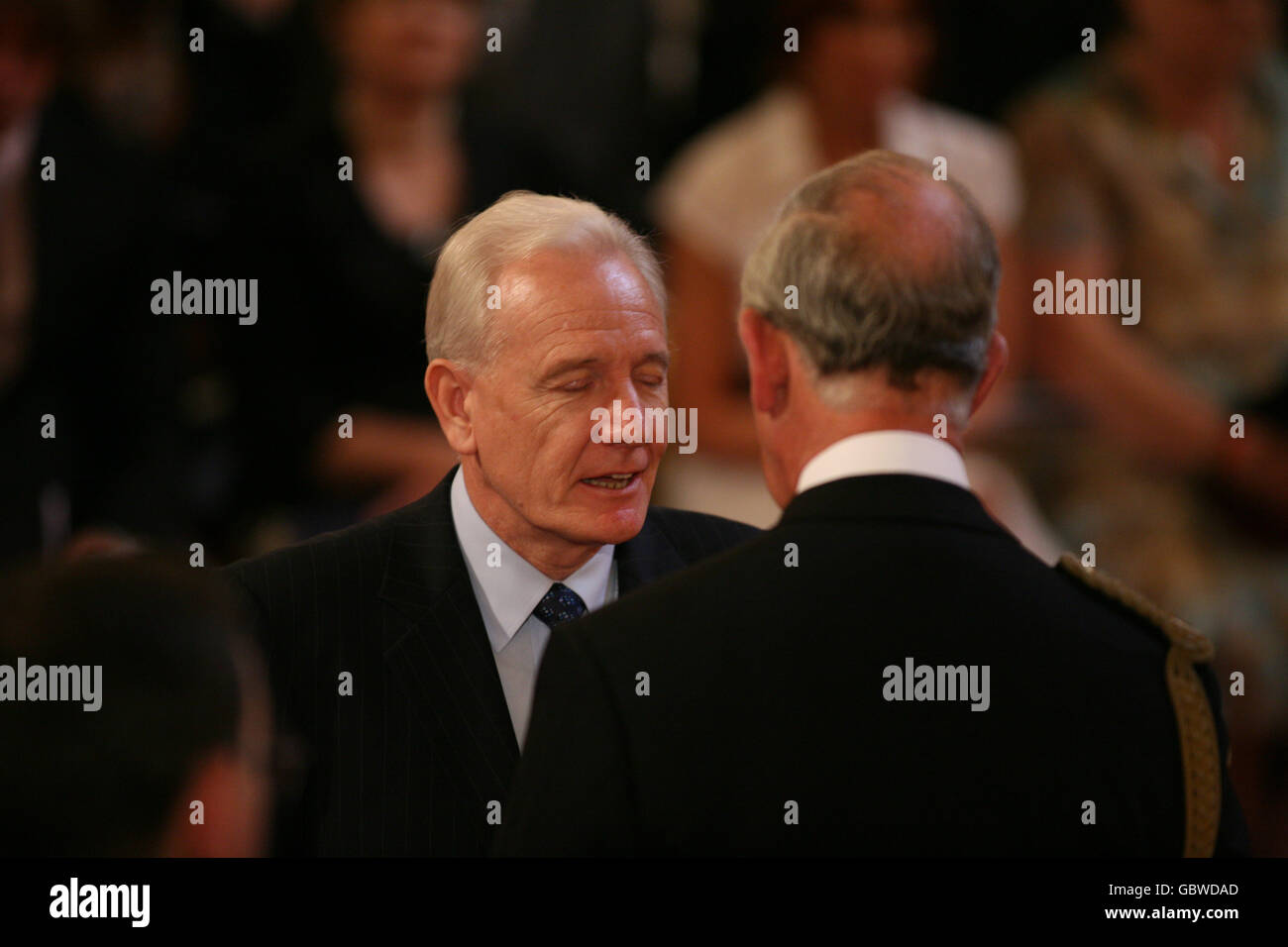 Mr. Paul Stennett from Horsham is made an MBE by the Prince of Wales at ...