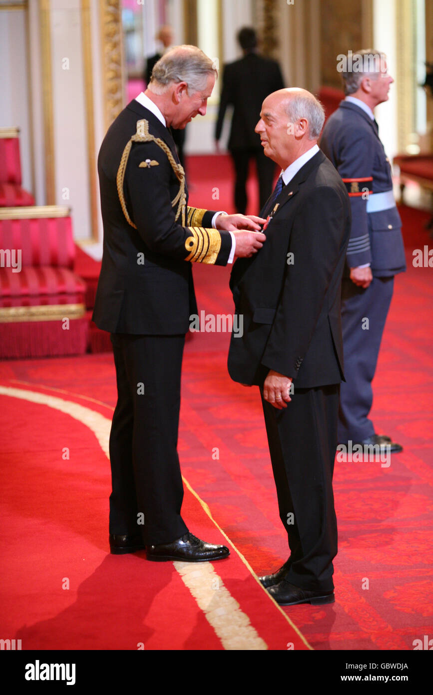 Mr. Paul Millard is made an MBE by the Prince of Wales at Buckingham ...