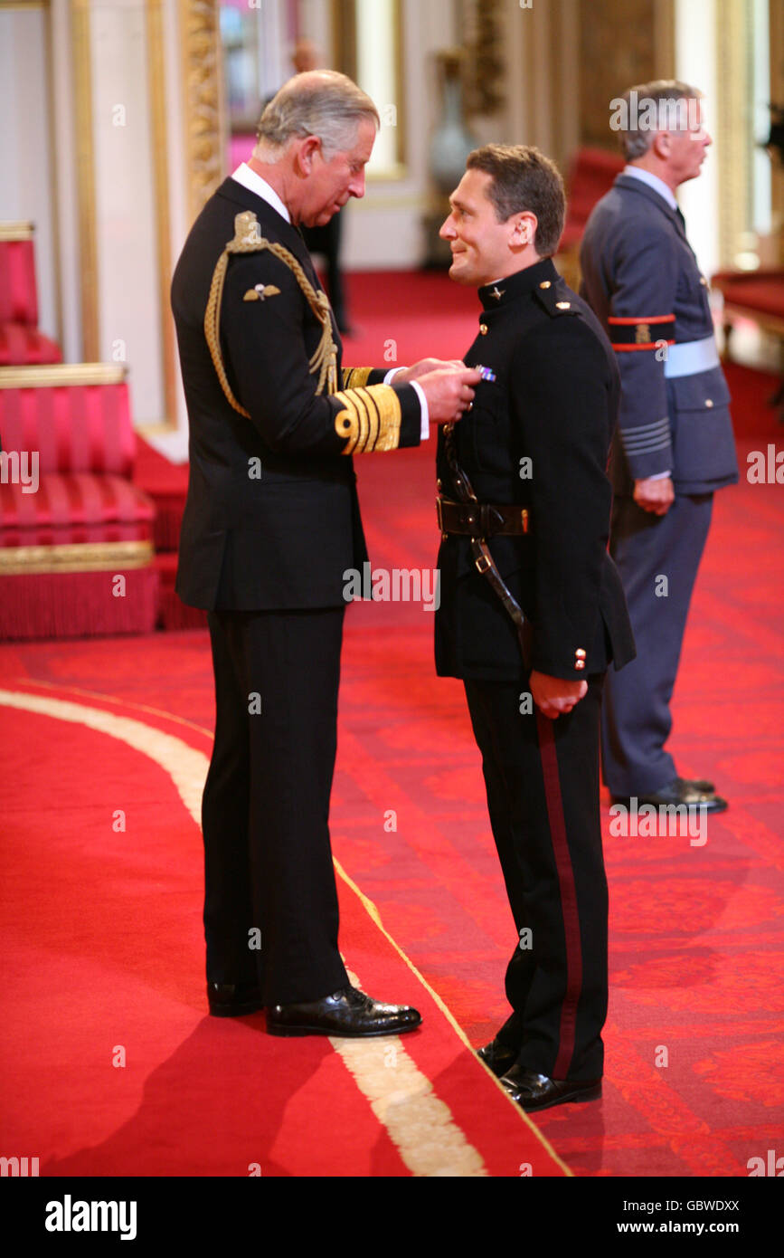 Major Adam Dawson is decorated with The Military Cross for services in ...