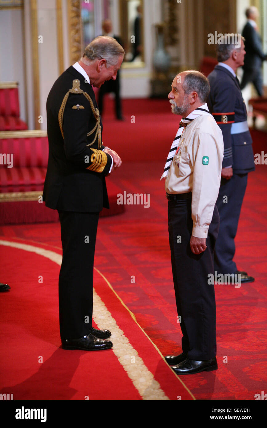 Mr. Peter Haigh from Halifax is made an MBE by the Prince of Wales at ...