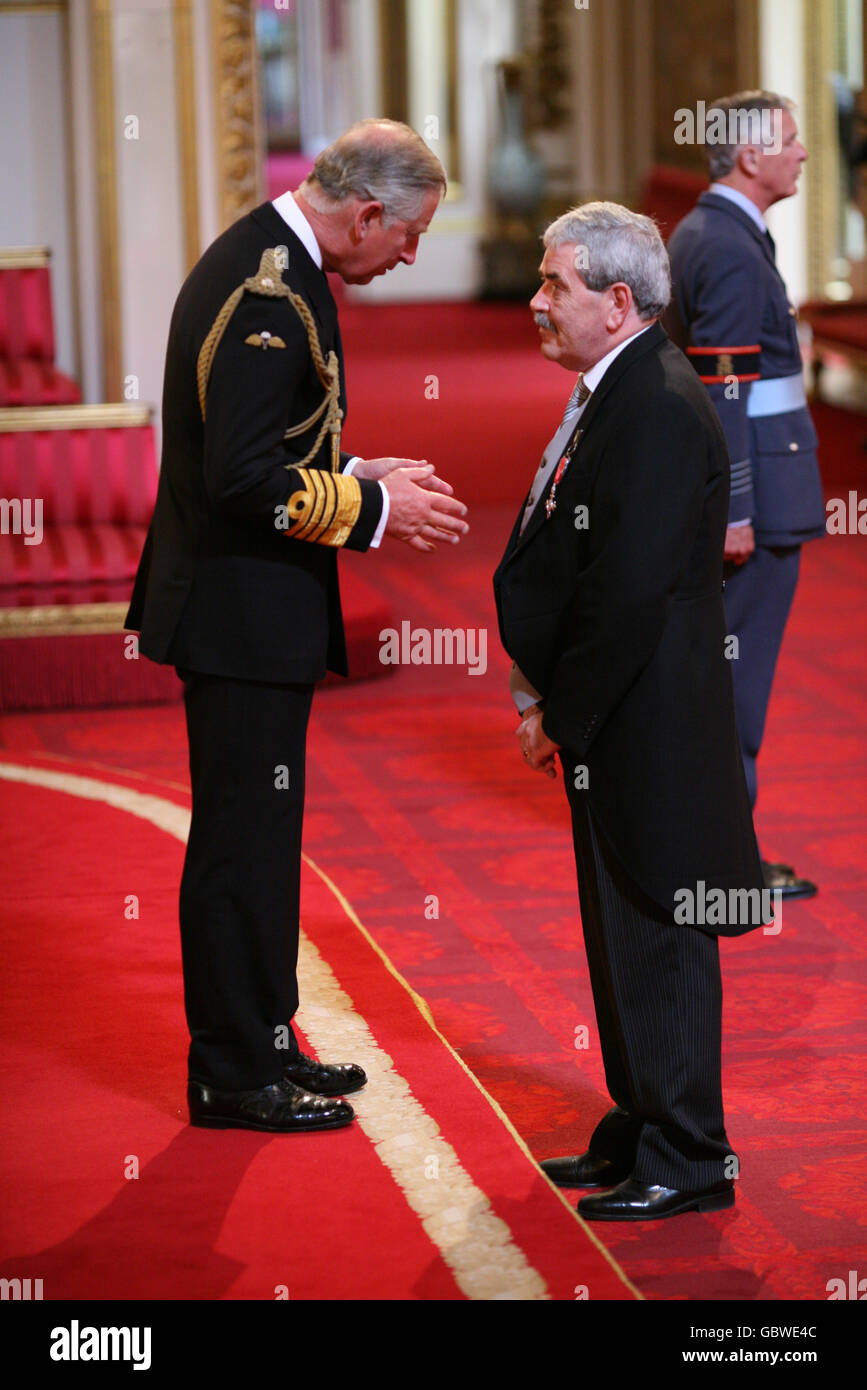 Mr. George Creighton is made an MBE by the Prince of Wales at ...