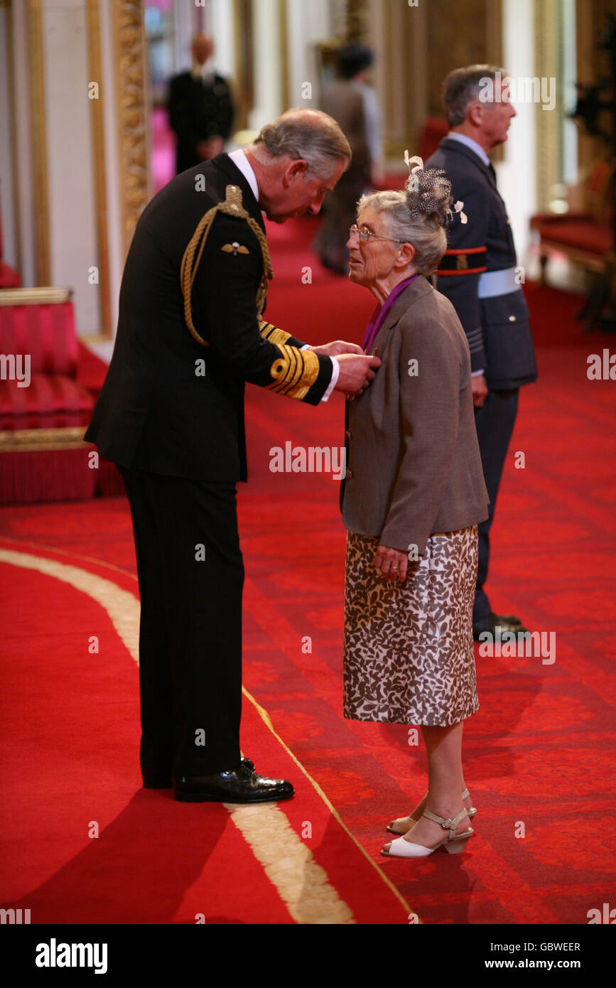 Mrs Jenifer Cooper from Cambridge is made an MBE by the Prince of Wales ...