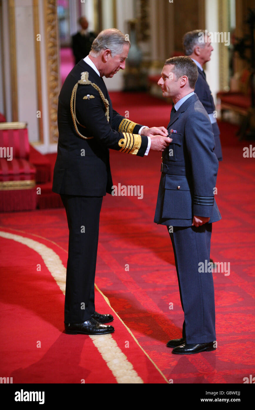 Wing Commander Anthony Keeling is made an MBE by the Prince of Wales at ...