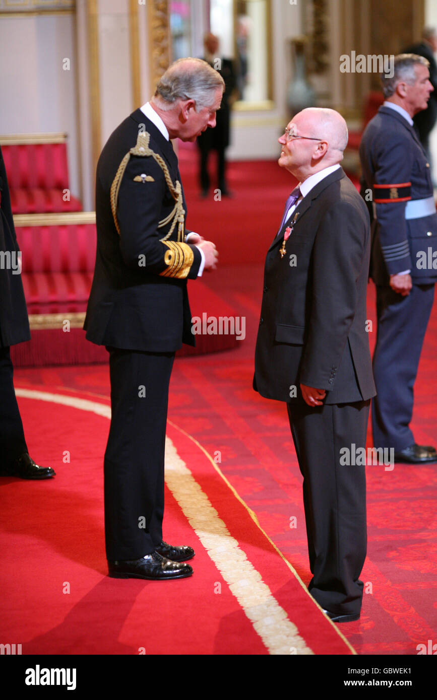 Dr. Stephen Davis from London is made an OBE by the Prince of Wales at ...