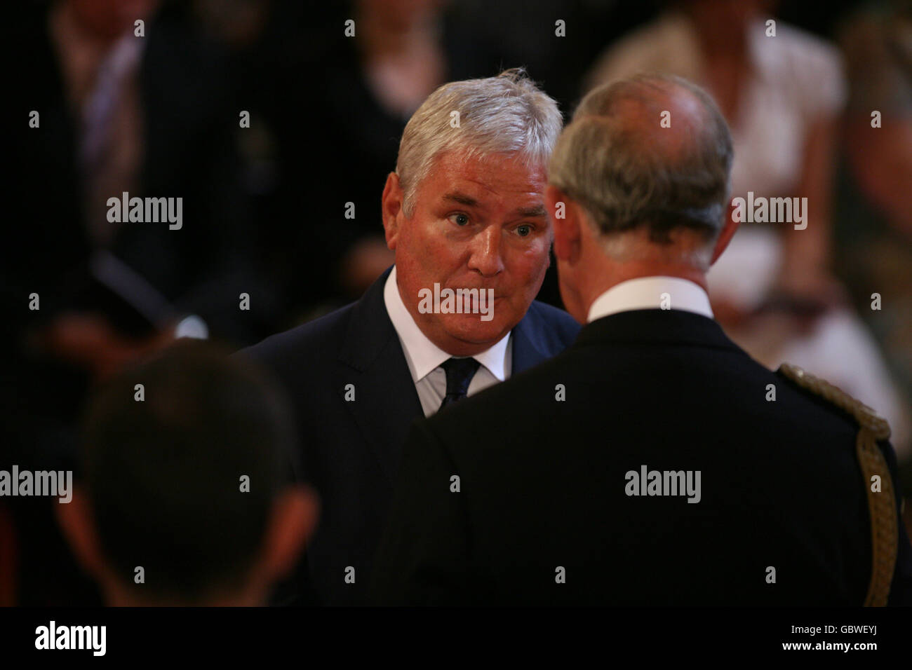 Mr. Terry Edwards from Orpington is made an MBE by the Prince of Wales ...