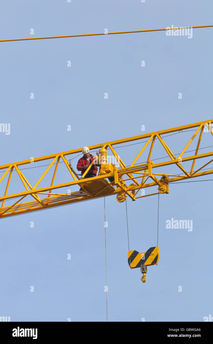 Operating tower crane hi-res stock photography and images - Alamy