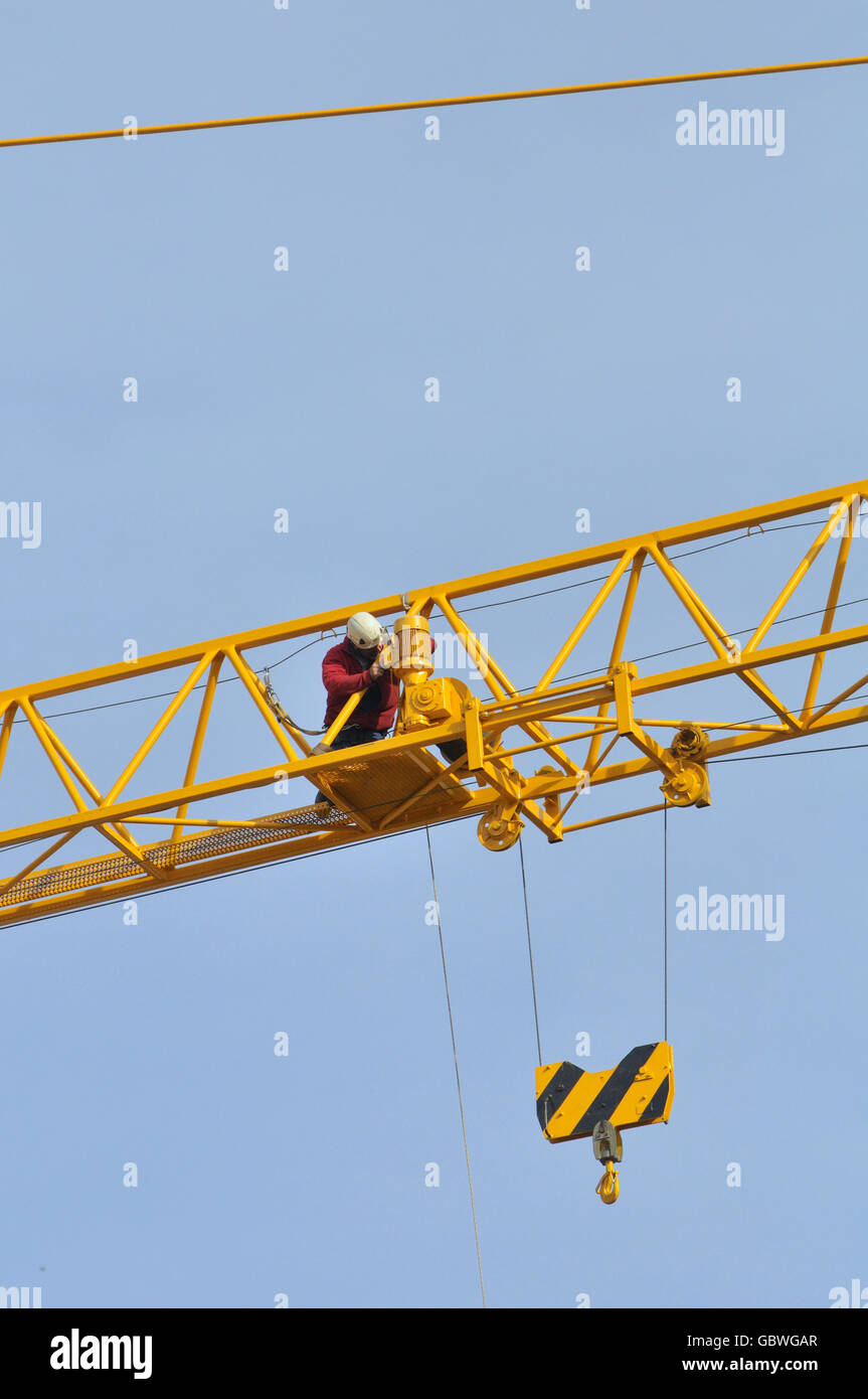 Operating tower crane hi-res stock photography and images - Alamy
