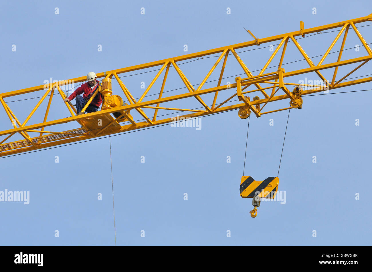 Operating tower crane hi-res stock photography and images - Alamy