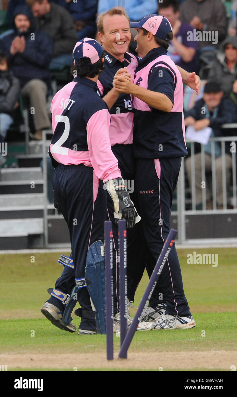 Middlesex's Shaun Udal celebrates bowling Surrey's Matthew Spriegel ...
