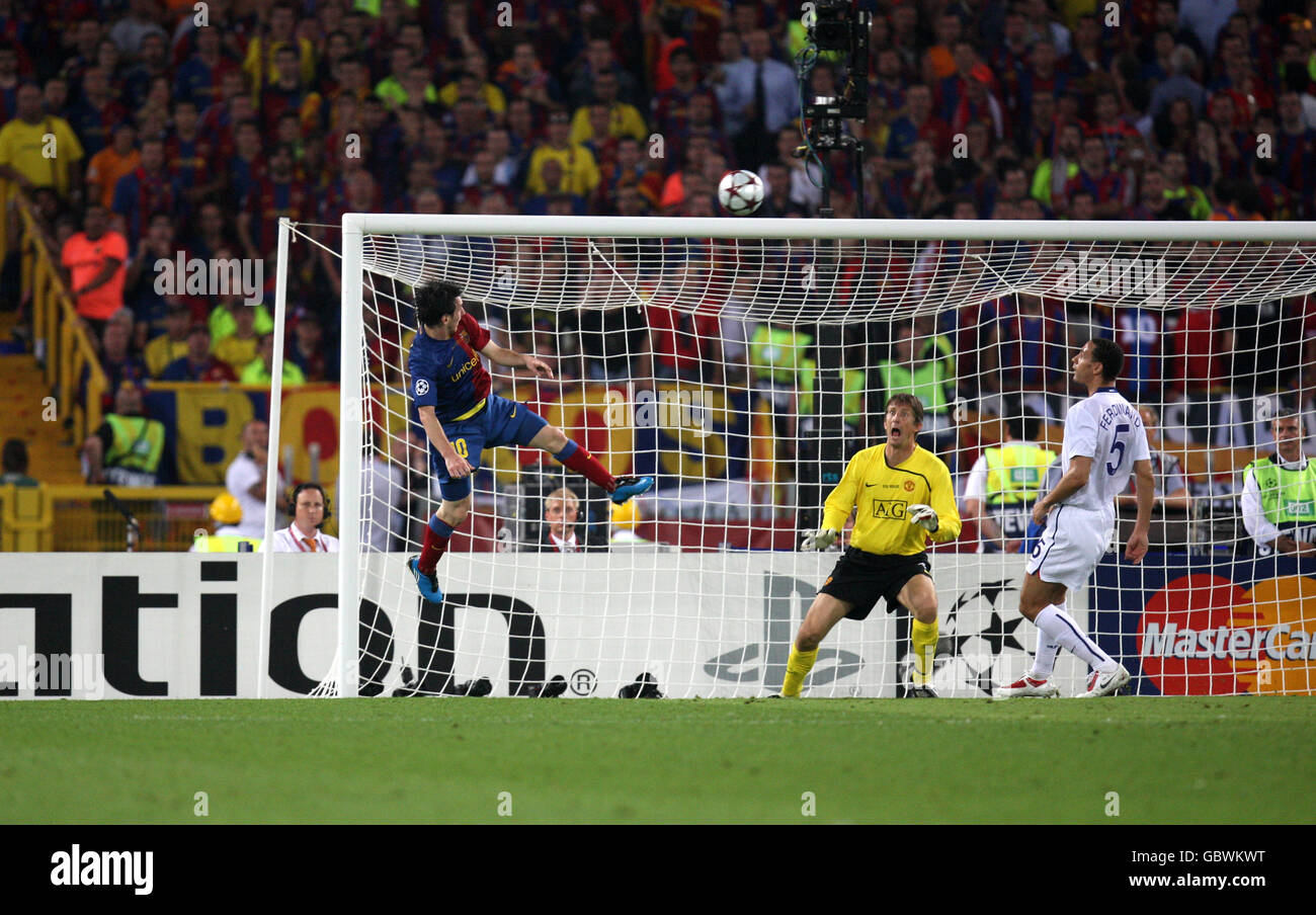 Barcelona's Lionel Messi (left) scores his sides second goal of the ...
