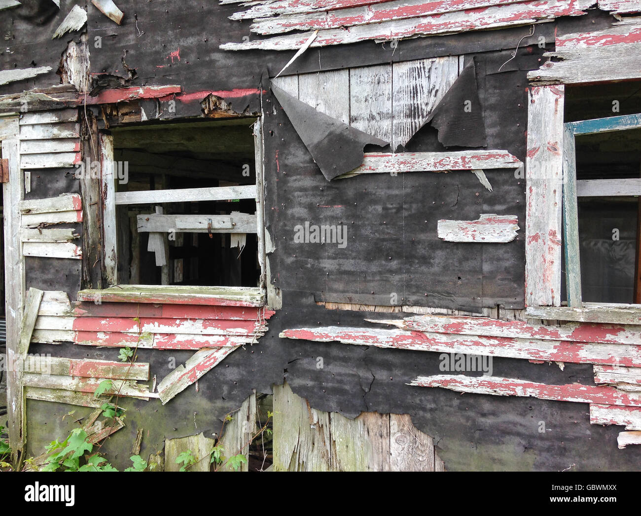 Window of an old, falling apart barn Stock Photo - Alamy