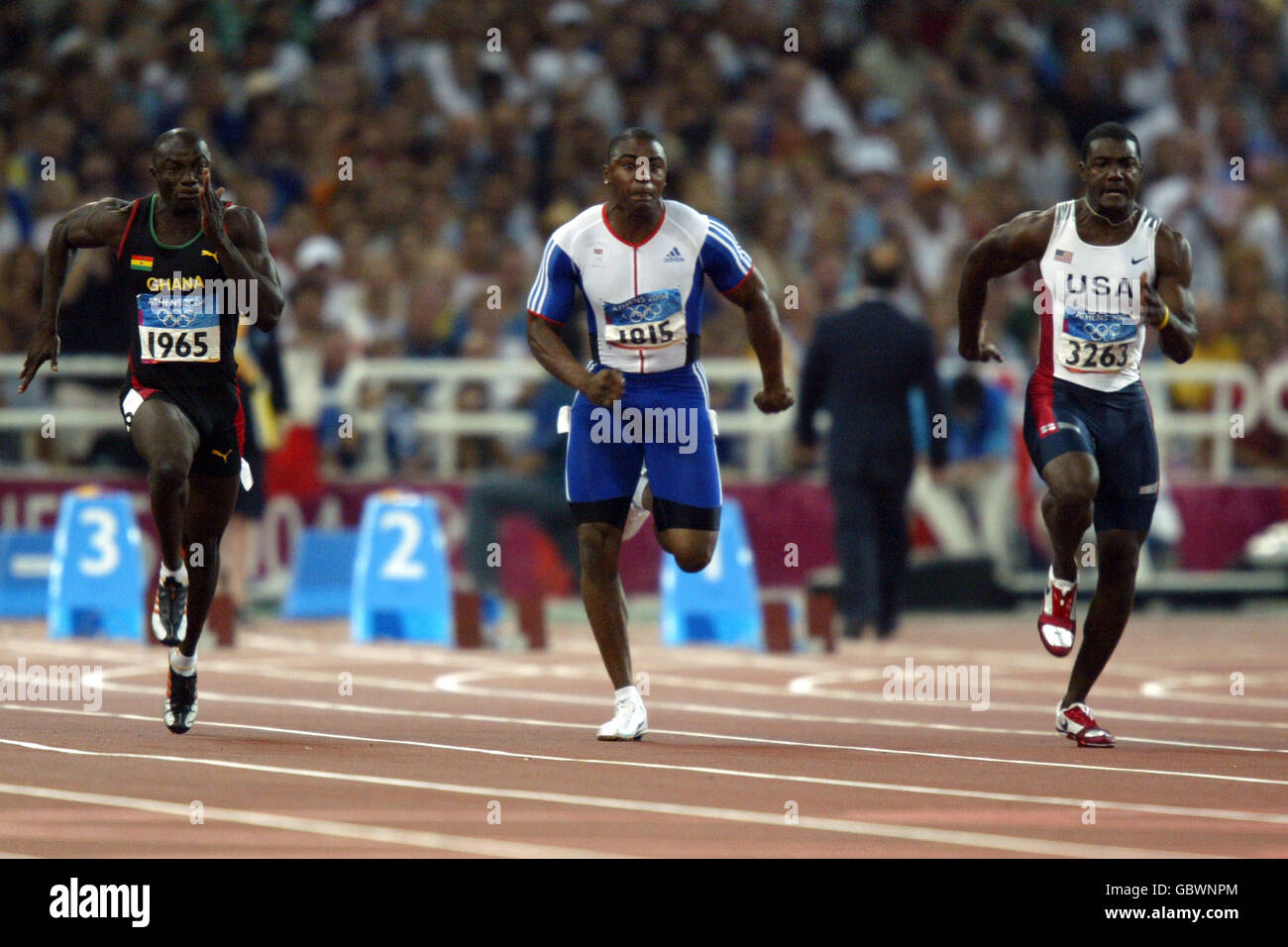 Great Britain's Mark Lewis-Francis (c) in action against Ghana'a Aziz ...