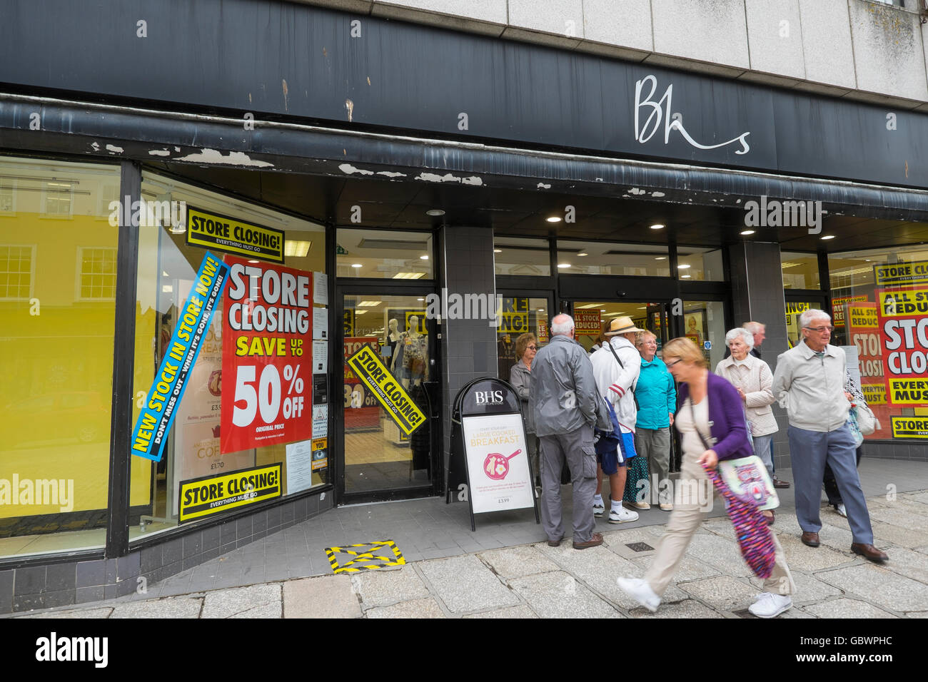 Shoppers outside British Home Stores shop in Cornwall, England, with ...
