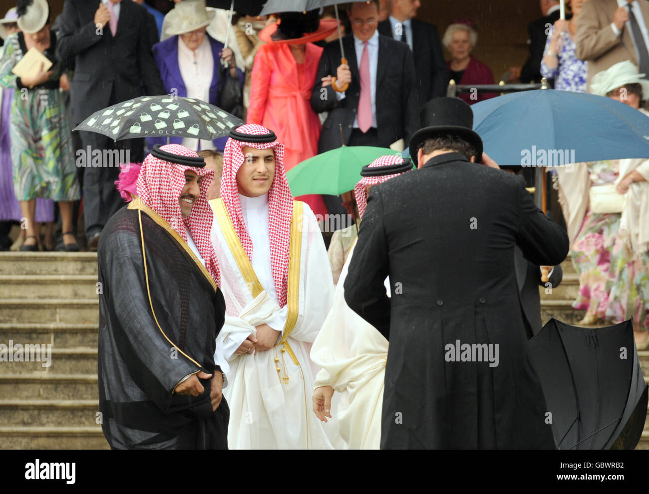 Guests during the first Royal Garden Party of the summer at Buckingham ...