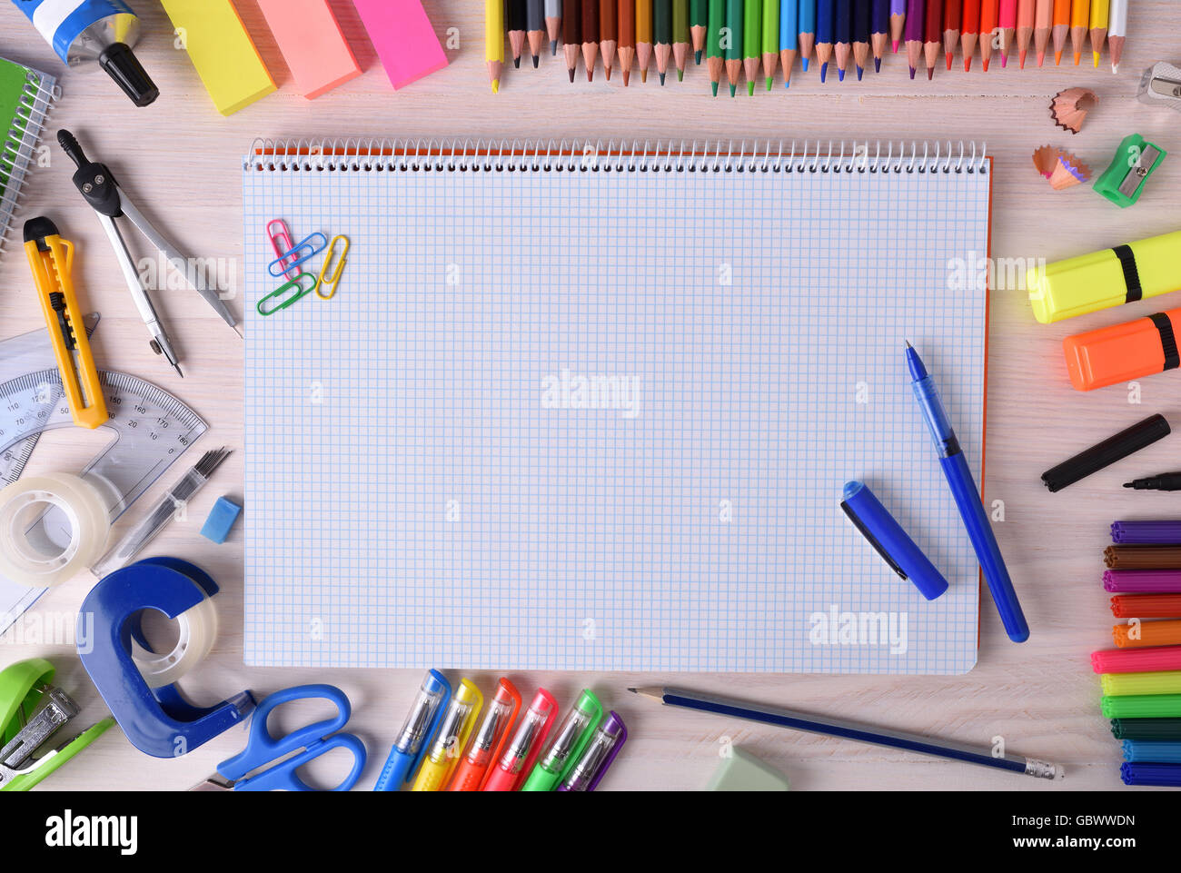 Background with school or office material with checkered notebook ...