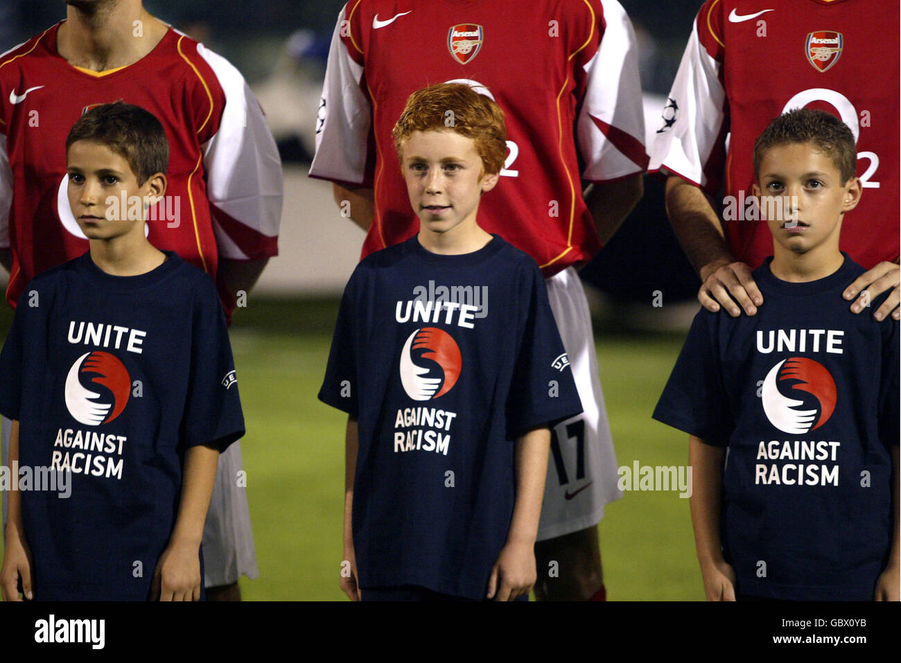 Mascots wearing Unite against racism t-shirts line up in front of the ...
