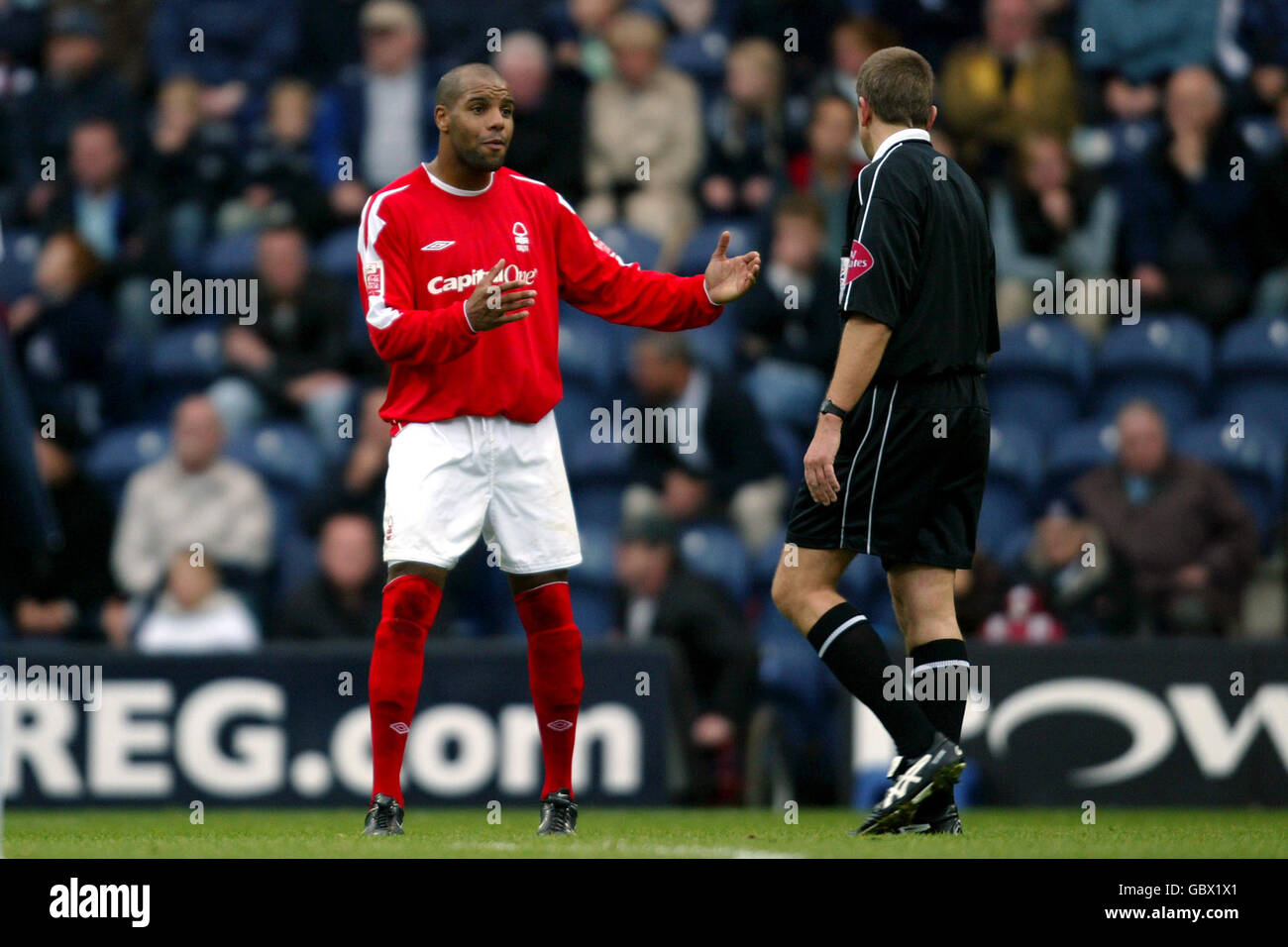 Nottingham Forest's Marlon King (l) argues with referee Anthony Bates ...