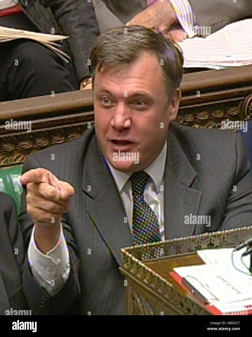 Schools Secretary Ed Balls points during Prime Minister's Questions in ...