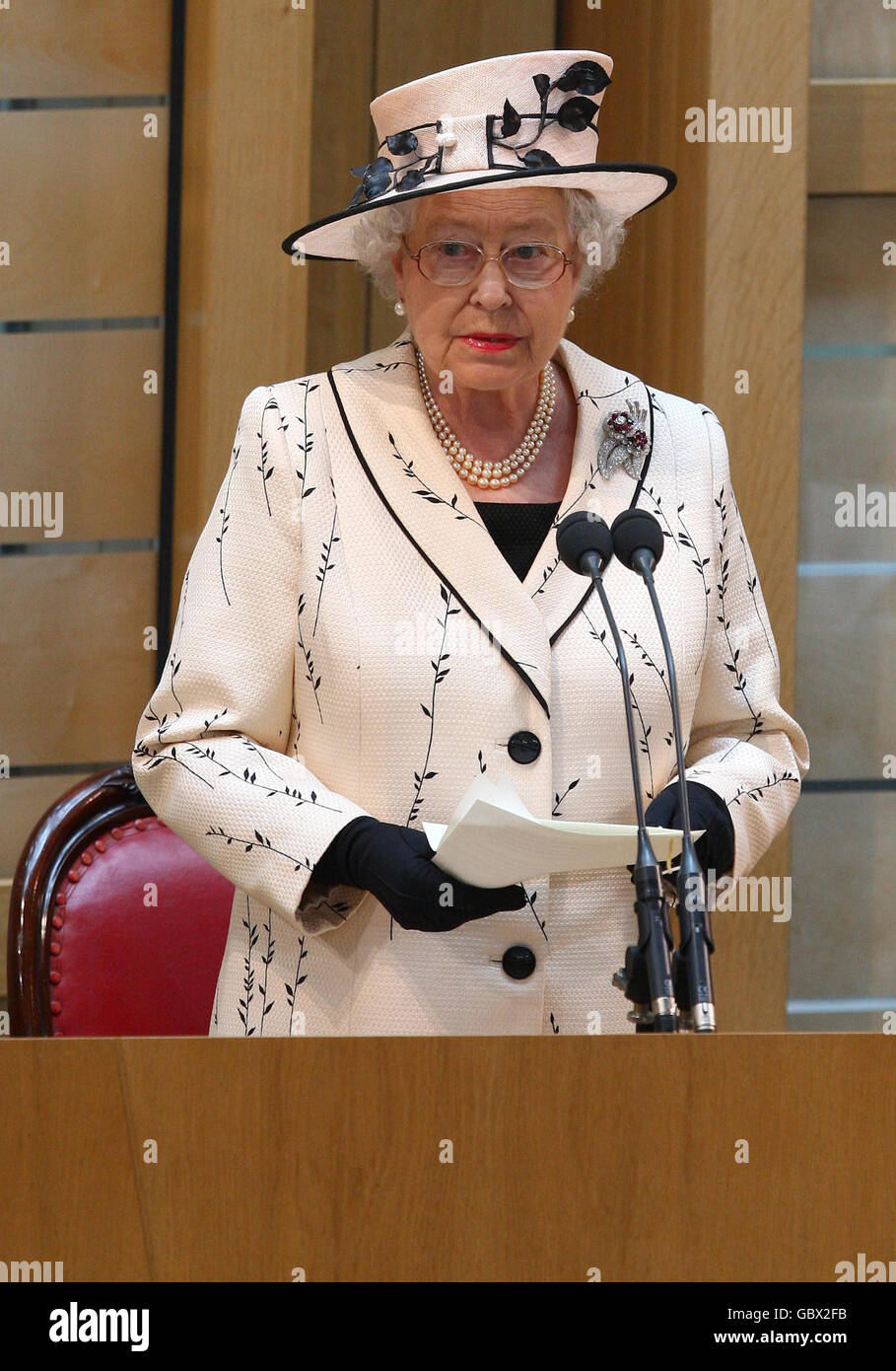 Queen Elizabeth II makes a speech in the chamber during a visit to the ...