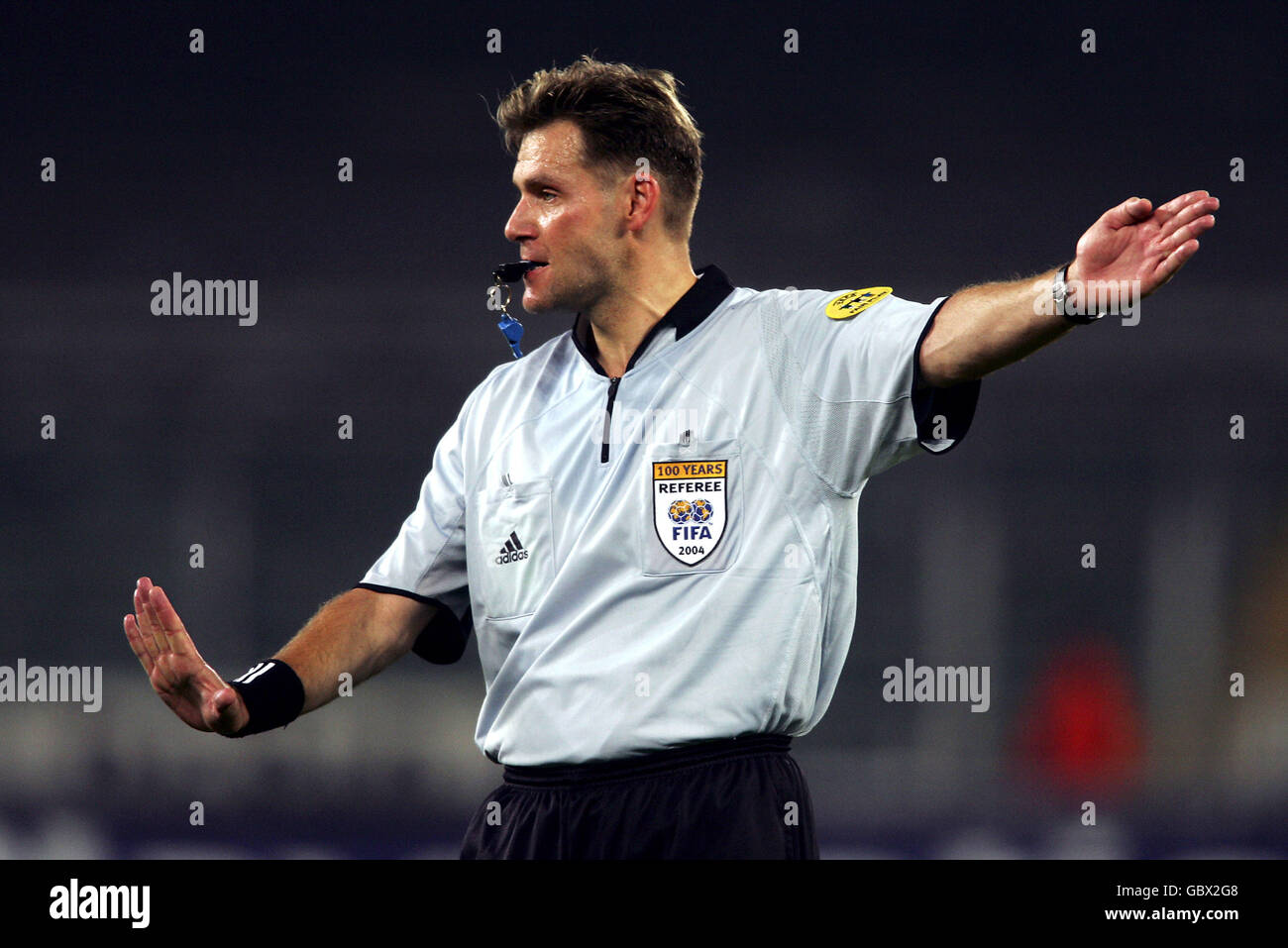 Football top half referee point hi-res stock photography and images - Alamy