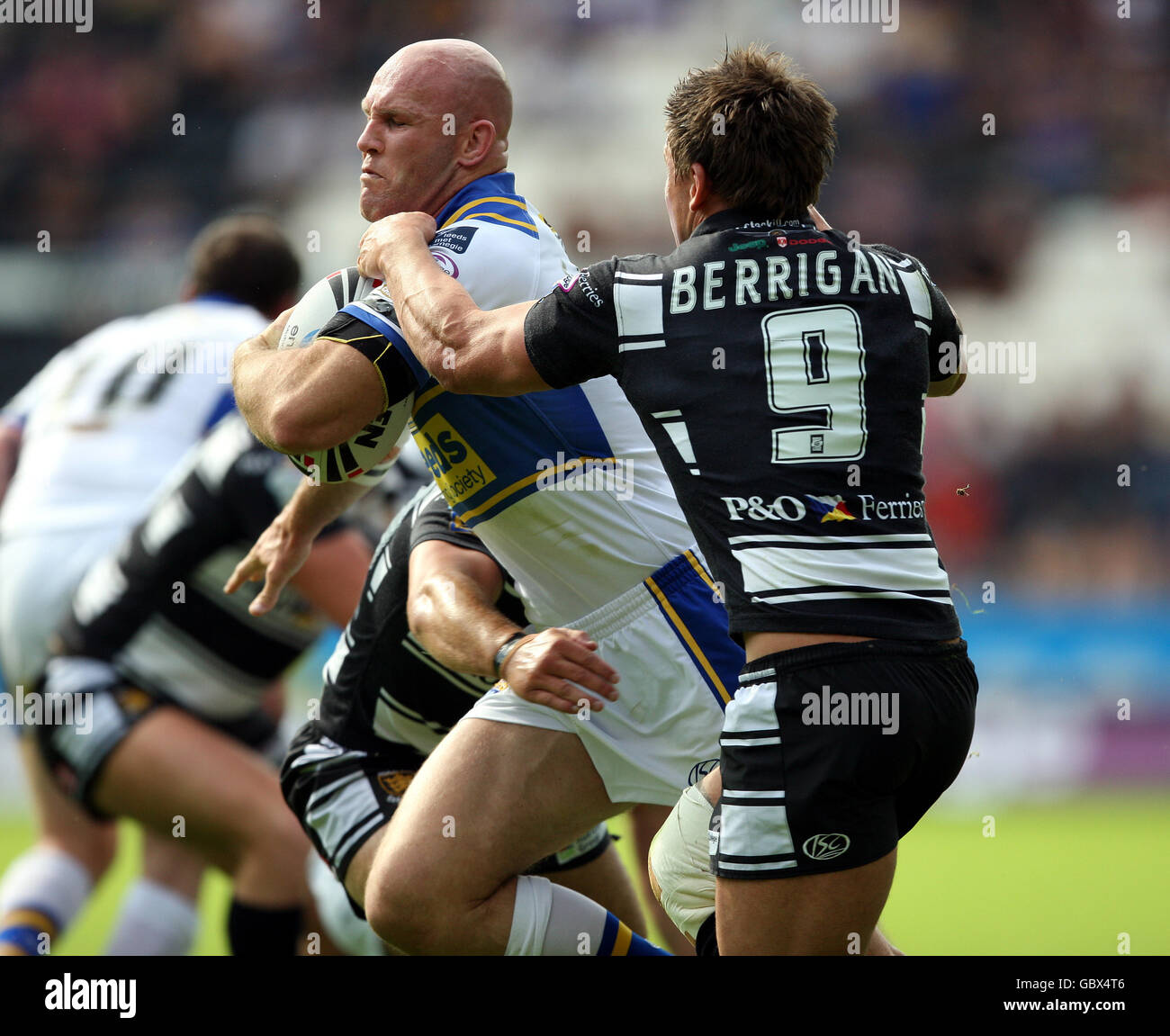 Leeds Rhino's Keith Senior is tackled by Hull FC's Shaun Berrigan Stock ...