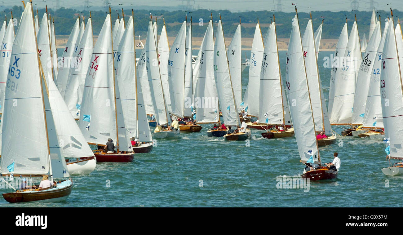 The X boats cluster together for their start from the squadron line ...