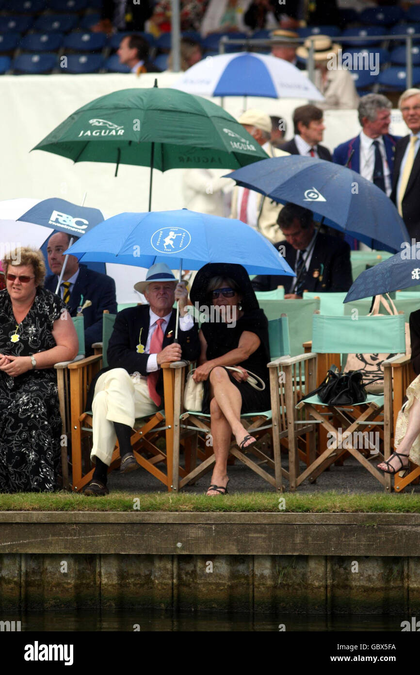 Rowing fans keep dry from heavy showers on finals day at Henley Royal ...