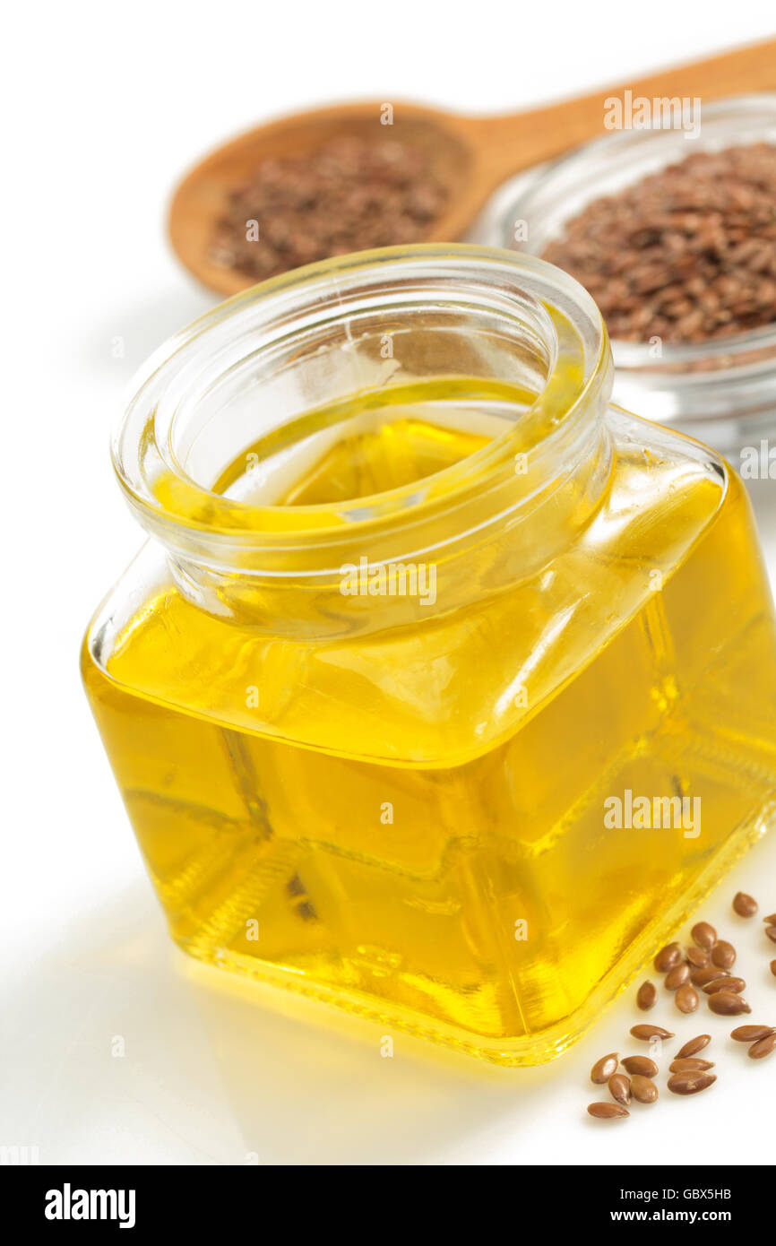 linseed oil in bottle isolated on white background Stock Photo - Alamy