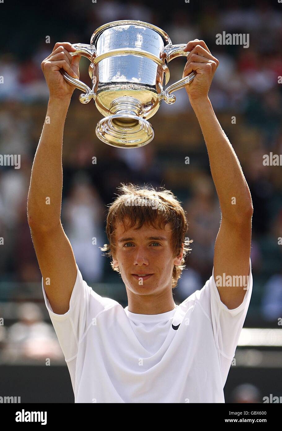 Russia's Andrey Kuznetsov celebrates with the trophy after beating USA ...